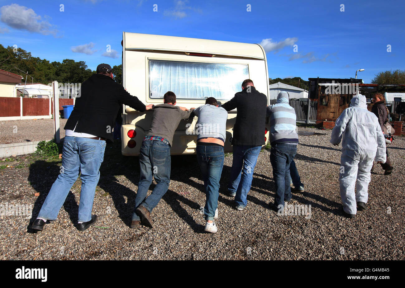 Residents of Dale Farm travellers site near Basildon, Essex, move a ...