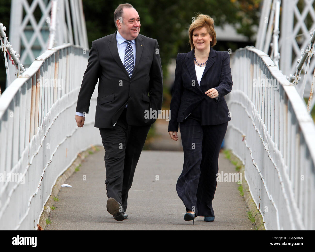 SNP Leader Alex Salmond and Deputy Leader Nicola Sturgeon walk across ...