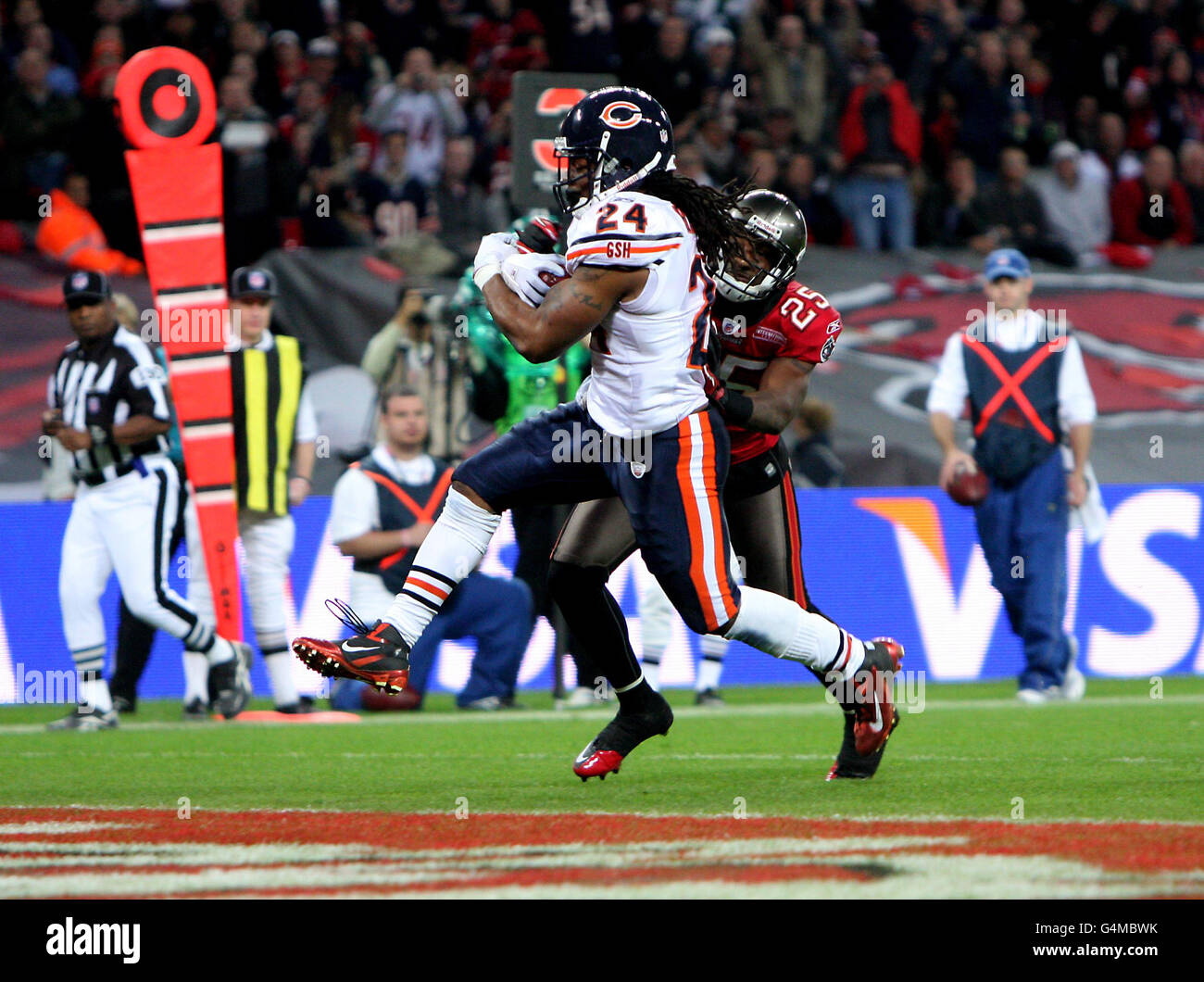 Gridiron nfl full length tackling mangvm scoopix hi-res stock ...