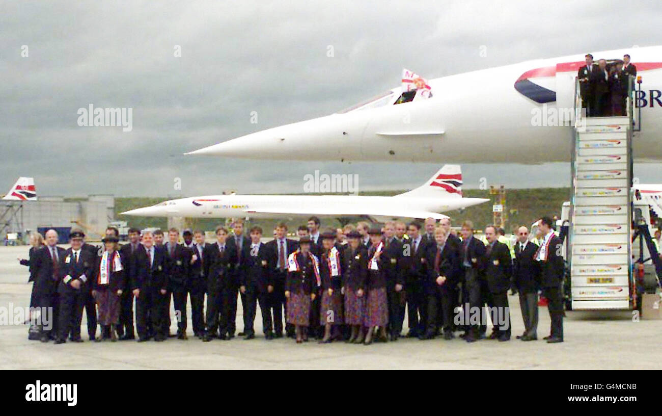 The Manchester United football team line up at Heathrow Airport with ...