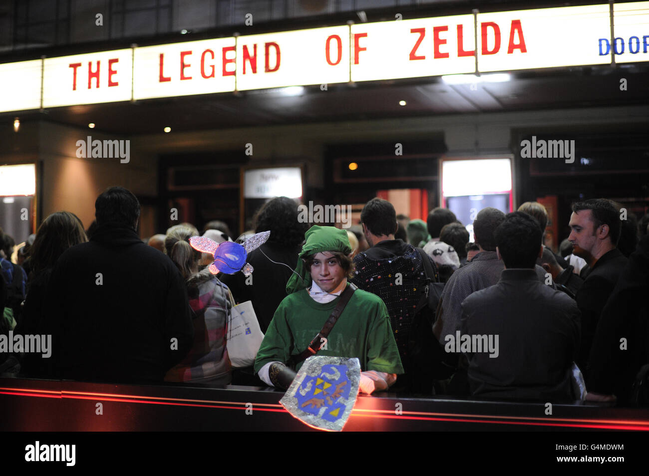 Fans pose (names not known) as they queue for Nintendo's Legend of ...