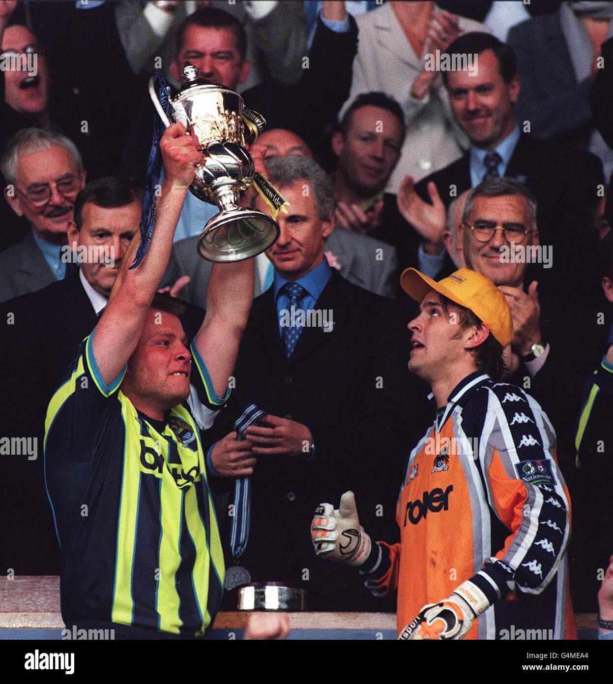 Manchester City's Andy Morrison lift's the trophy after his side ...
