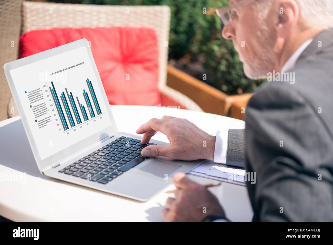 Busy man using laptop Stock Photo - Alamy