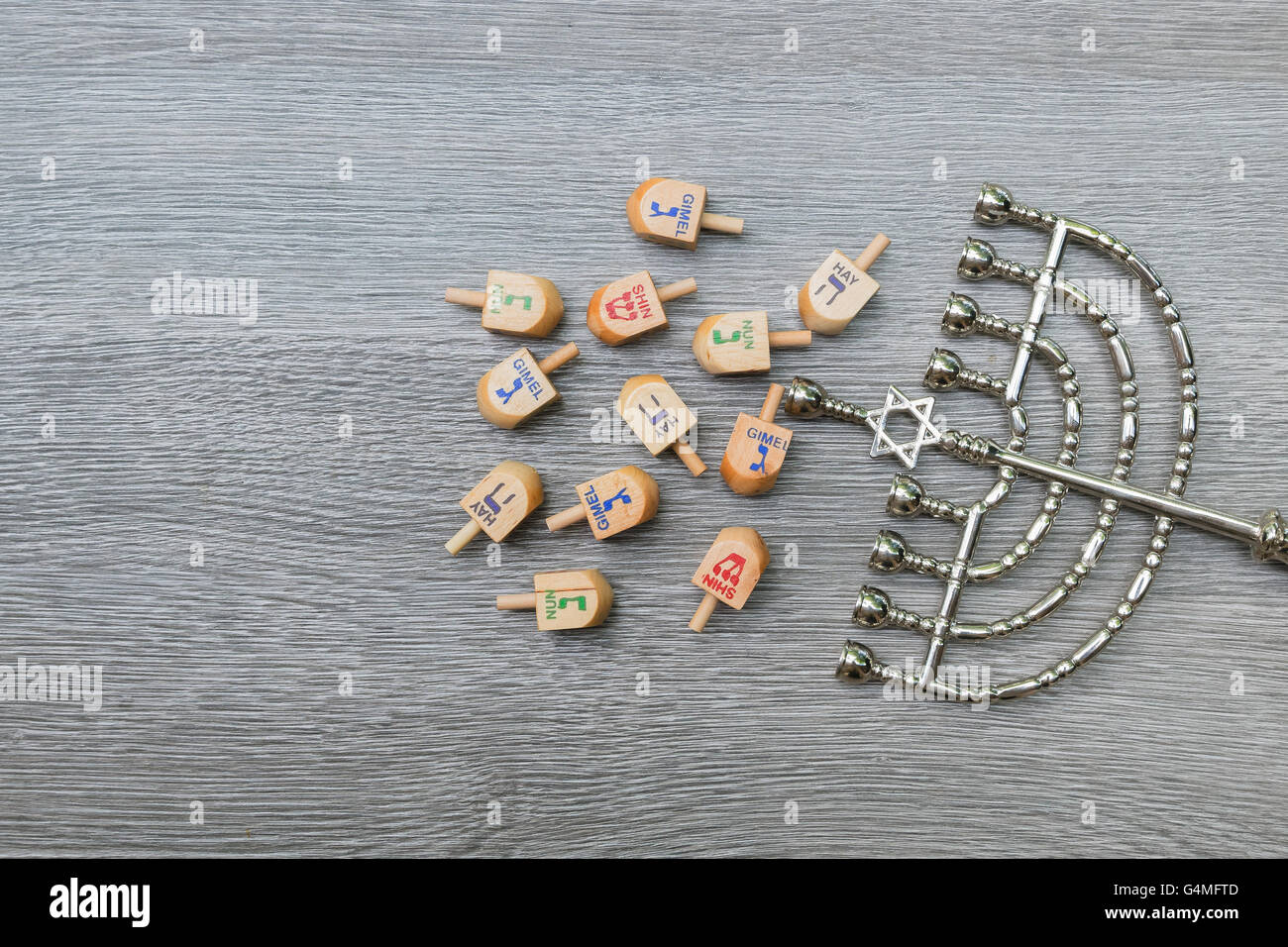Menorah on wooden table. Hanukkah symbol Stock Photo - Alamy