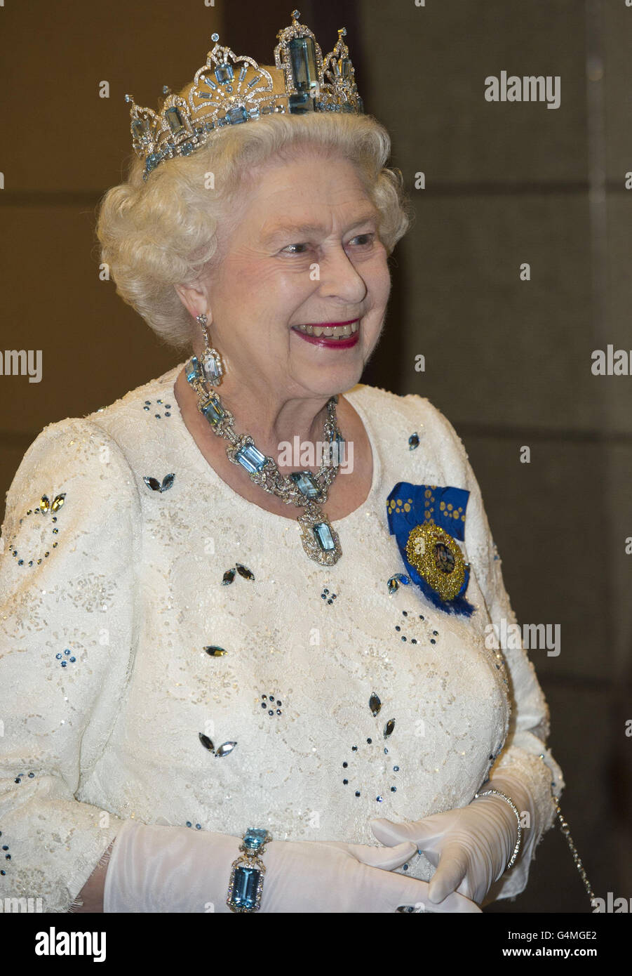 Britain's Queen Elizabeth II arrives at a banquet for Commonwealth ...