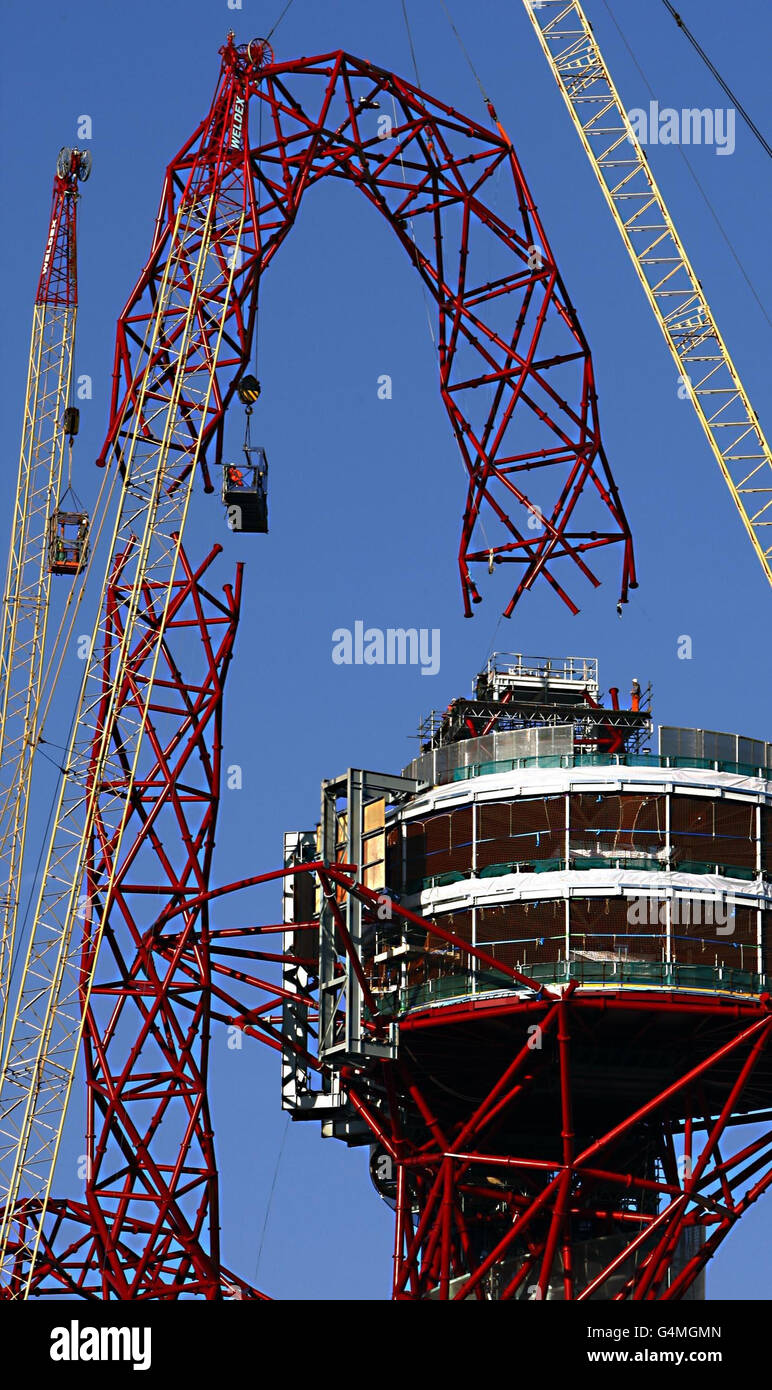 The final giant steel loop swings into place to complete the steel work ...