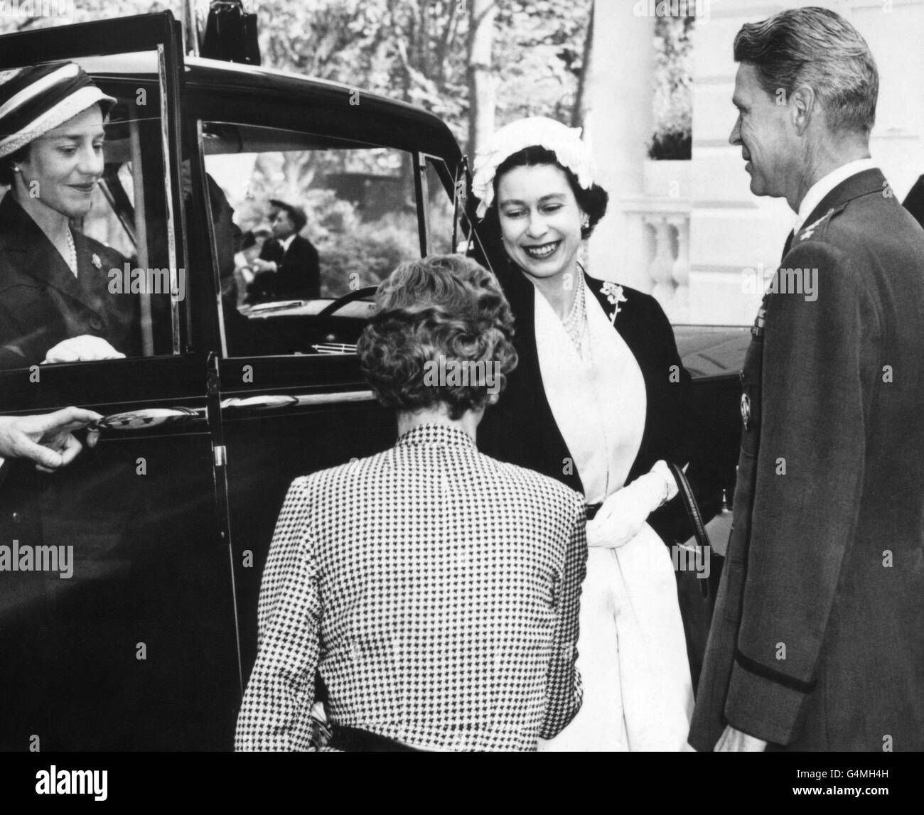 Queen Elizabeth II is welcomed by General Lauris Norstad, the Supreme ...