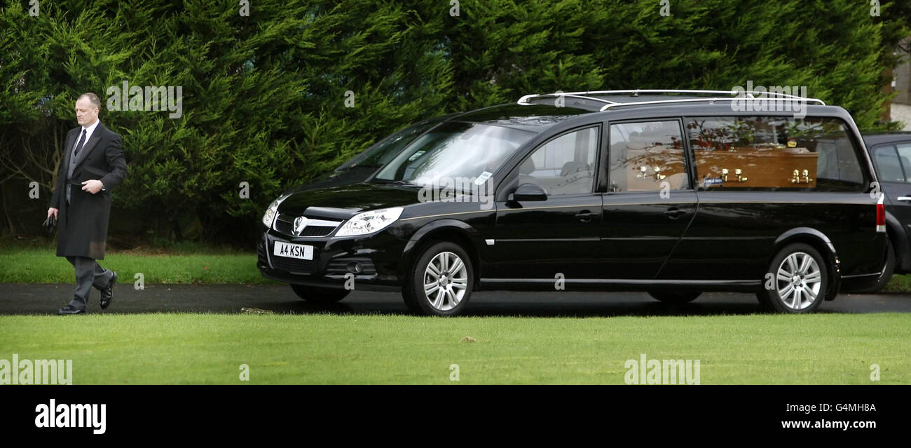 The hearse carrying the coffin of Thomas Sharkey, who died after a ...