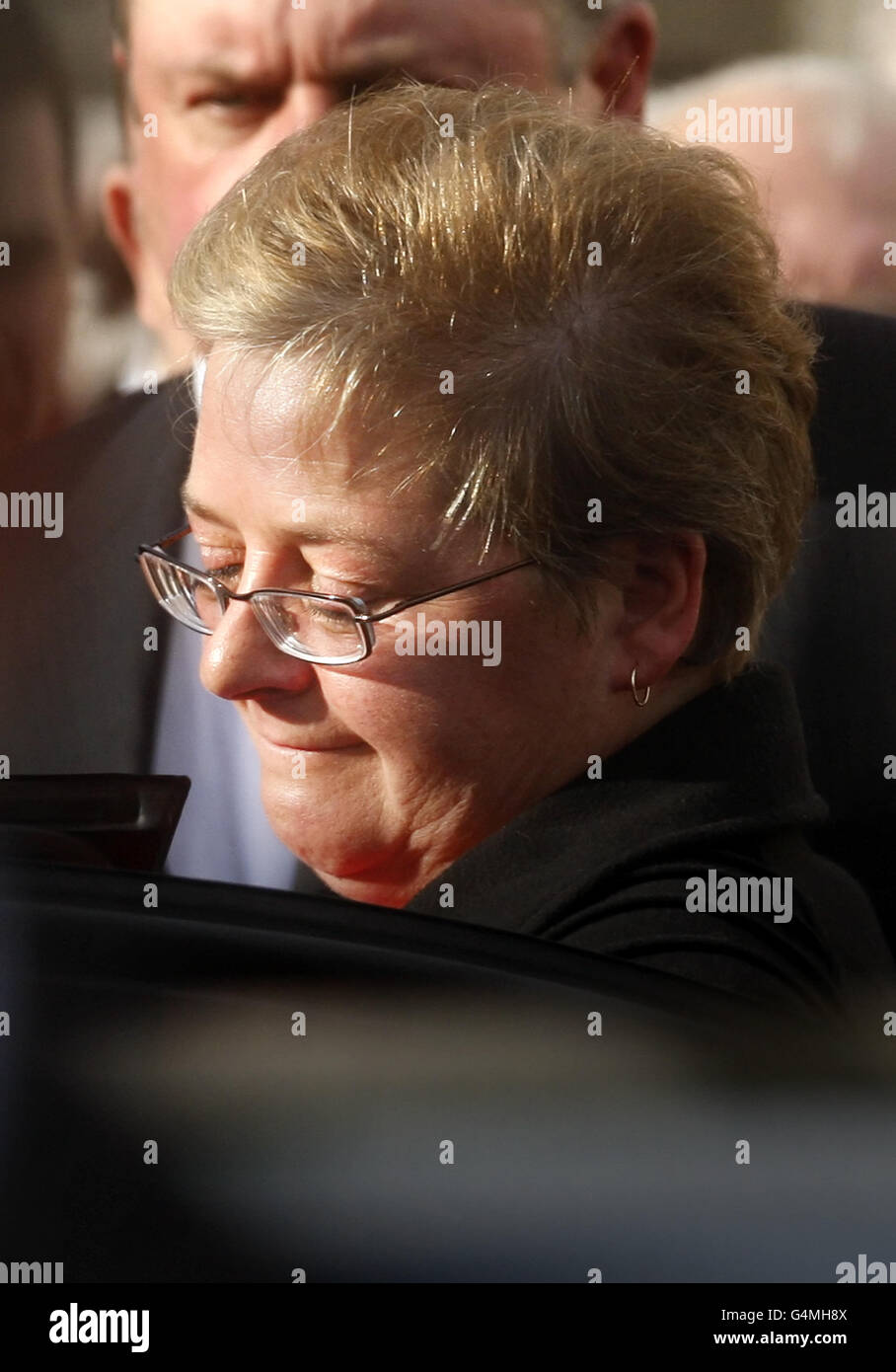 Following the funeral of her husband and their two children hi-res ...