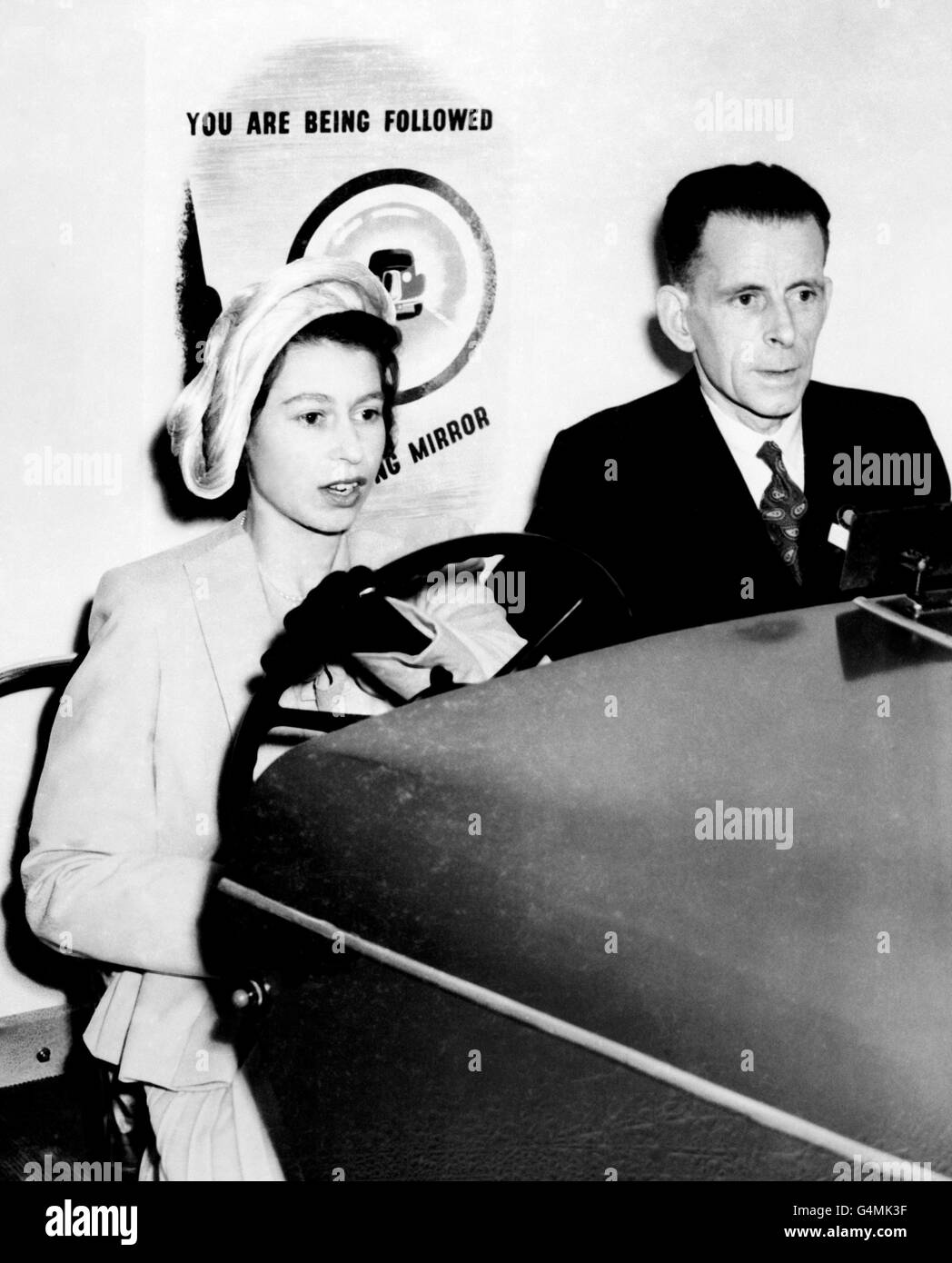 Princess Elizabeth at the wheel of a mechanical driving trainer in ...