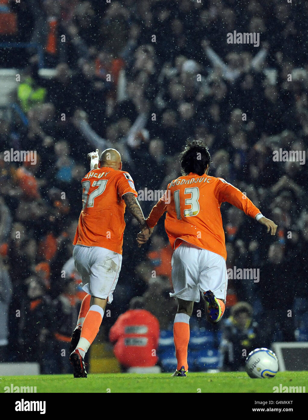 Blackpool's Jonjo Shelvey (left) celebrates with Daniel Bogdanovic his ...