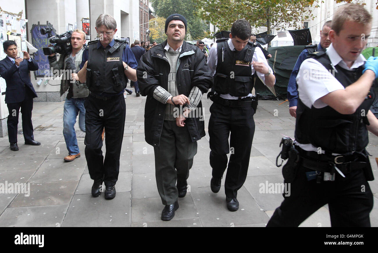 Police taking man away hi-res stock photography and images - Alamy
