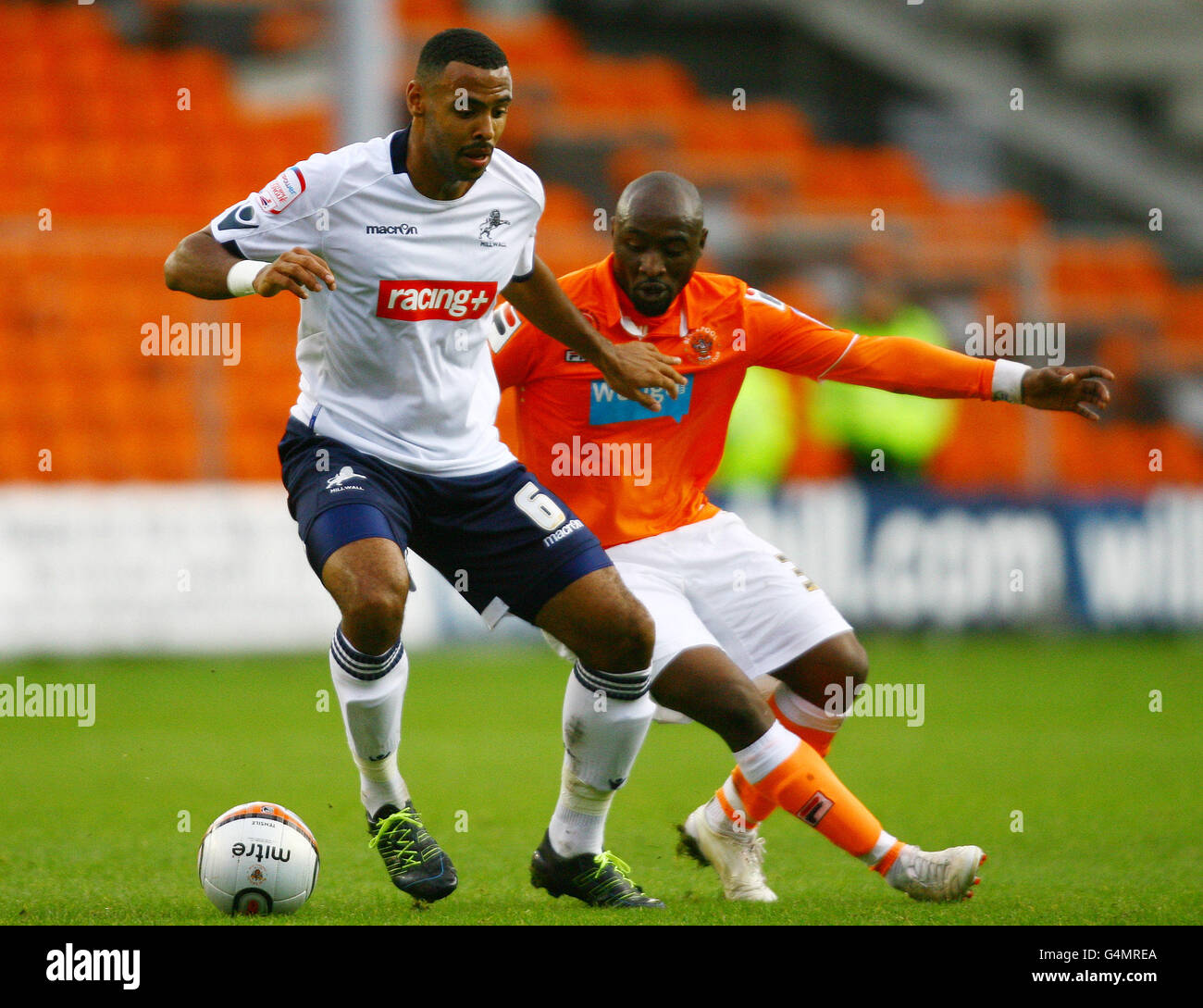 Blackpool's Lomano Lua Lau and Millwall's Liam Trotter (left) during ...