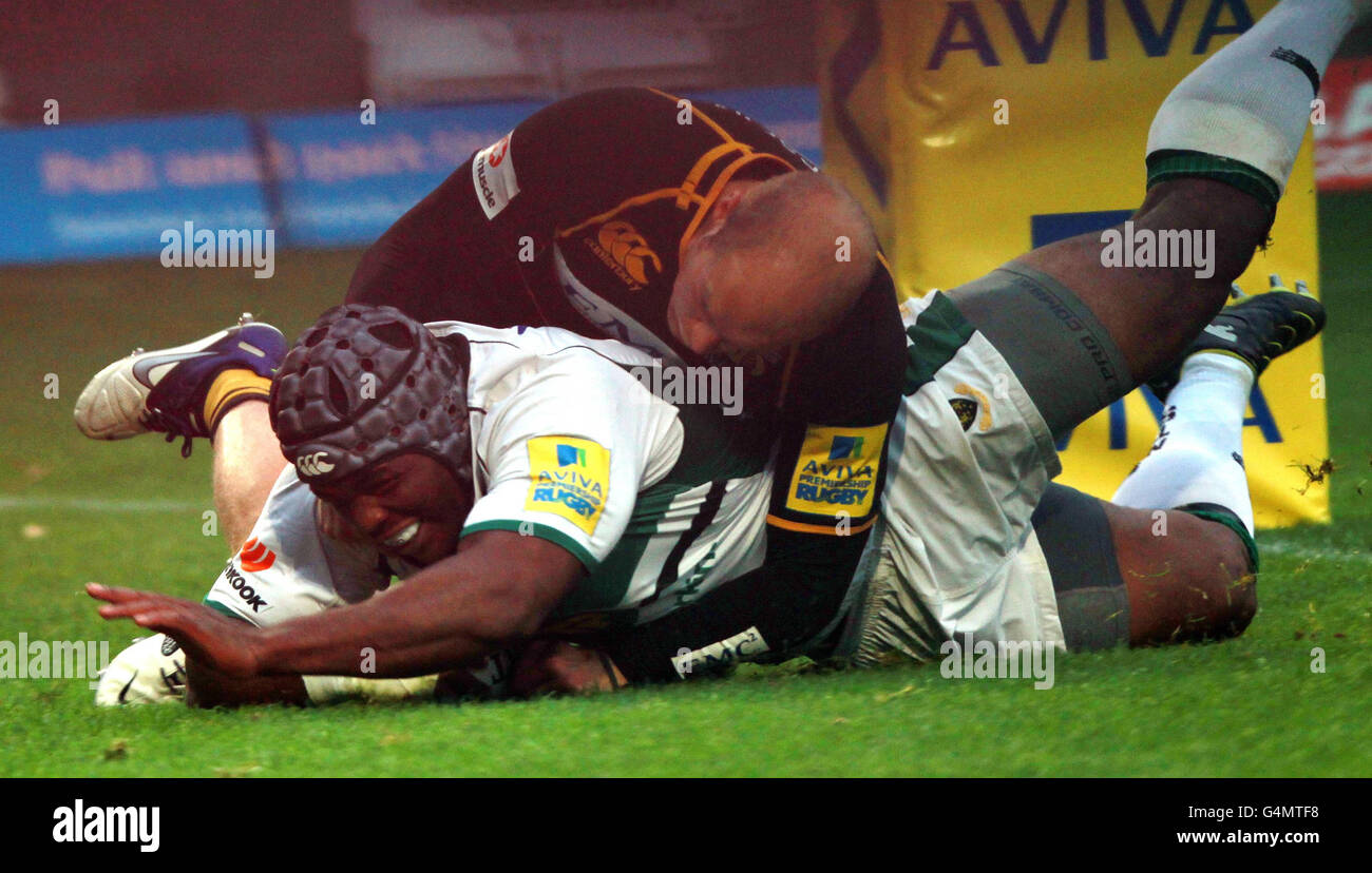Brian Mujati scores Northampton's second try during the Aviva Premier ...