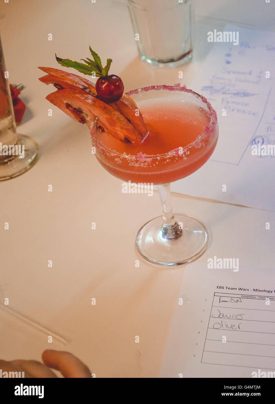 creating new cocktail recipe and taking down notes Stock Photo - Alamy