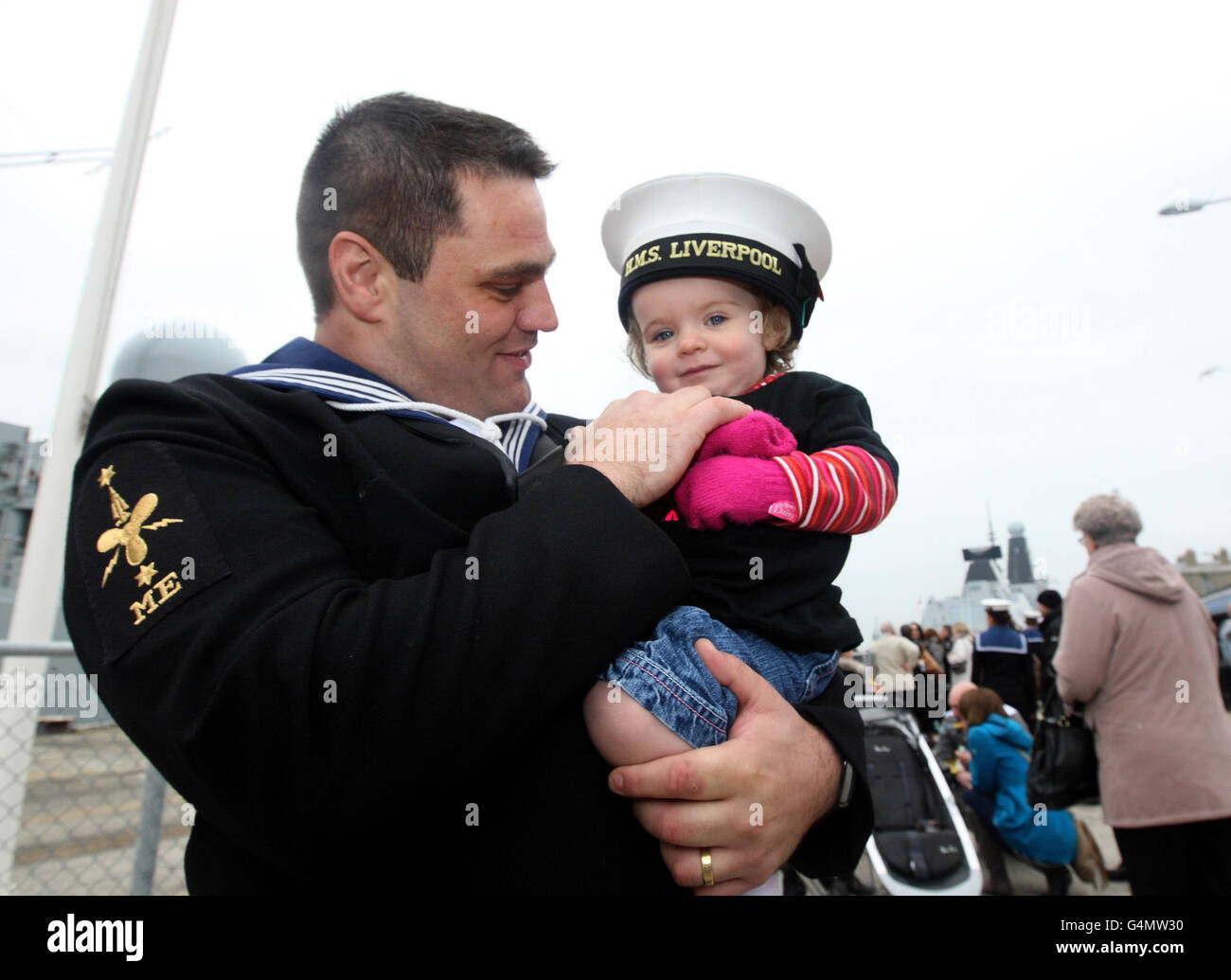 Leading Hand Anthony Barnes with daughter Sophie following the return ...