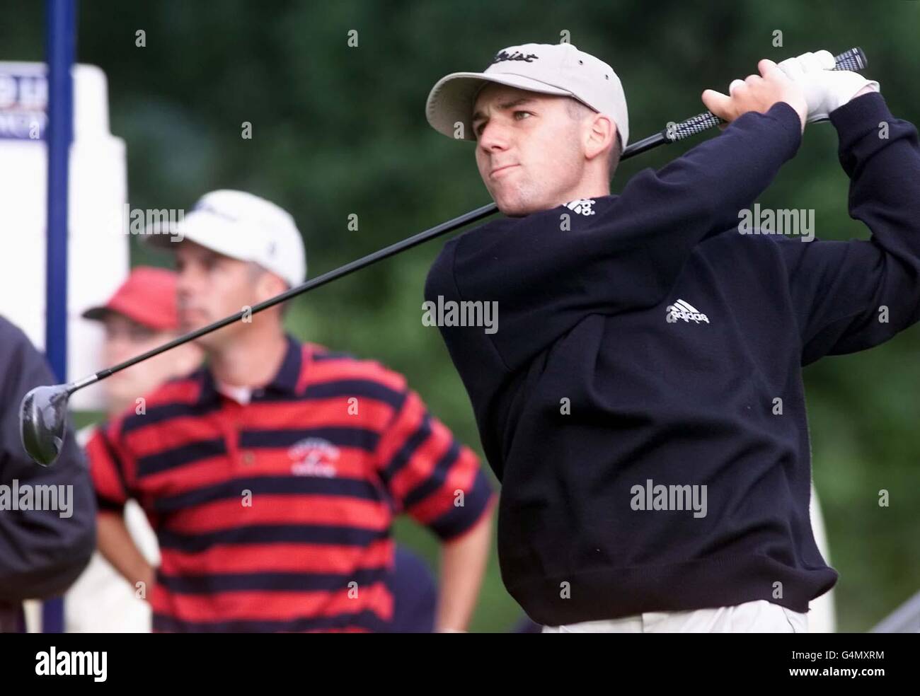 Spain's Sergio Garcia tees off on the first hole as Scotland's Dean ...