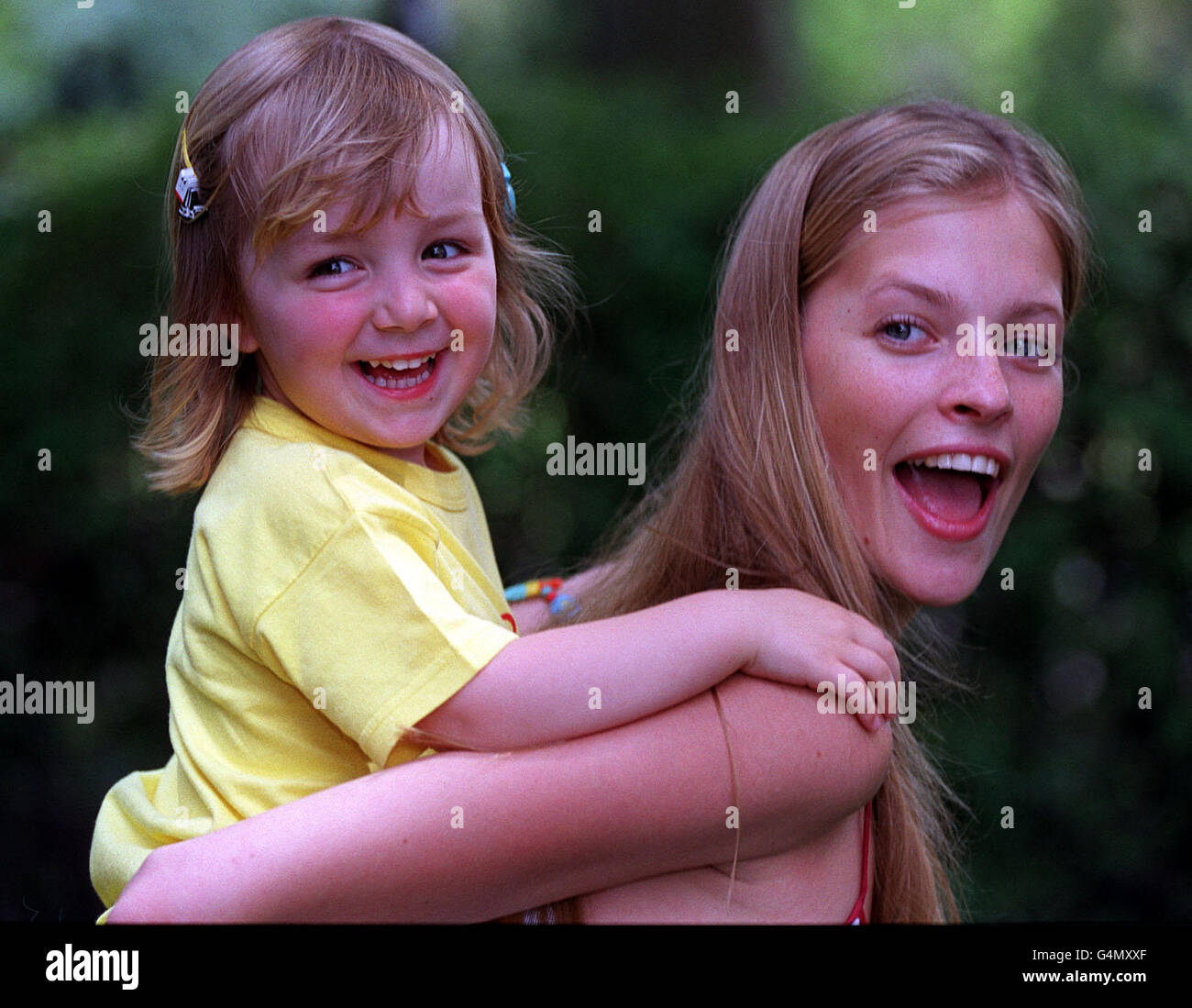 Top model Sarah Thomas with two year old Alice Lord, who won the Tumble ...