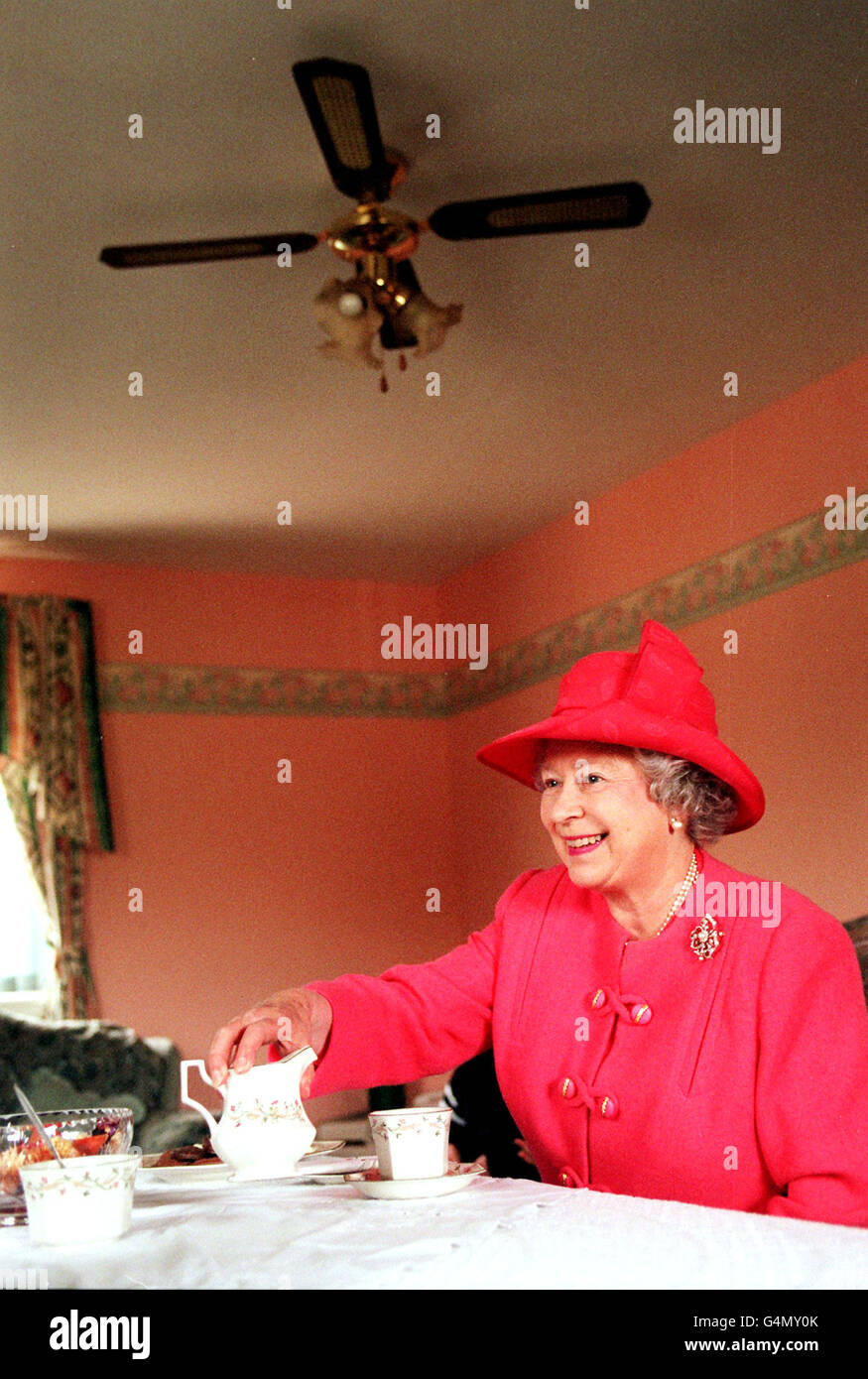 The queen joined mrs susan mccarron her ten year old son hi-res stock ...