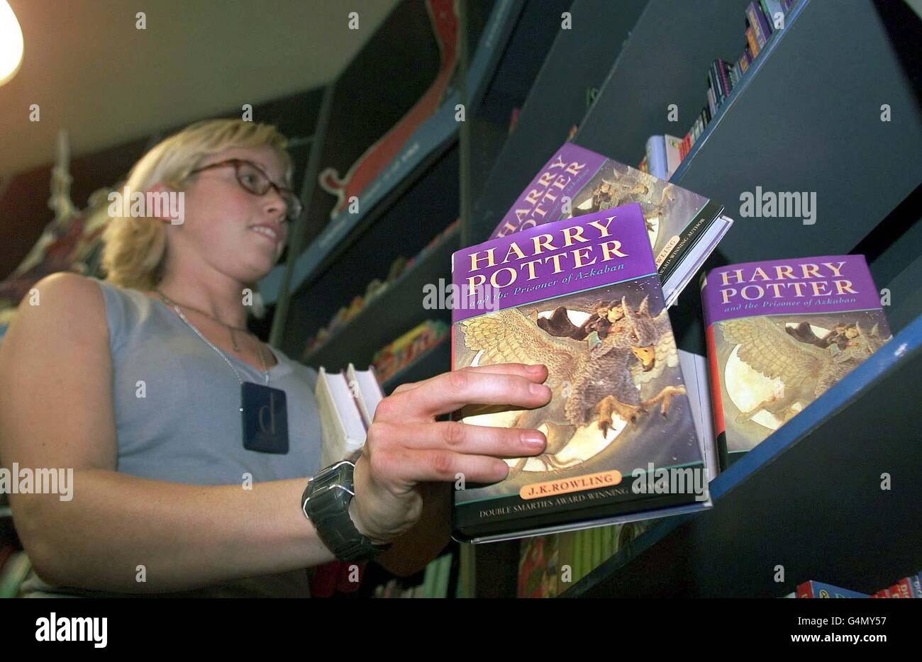 Bookseller Louise Bell, 23, stocks the shelves at Dillons, Newcastle ...