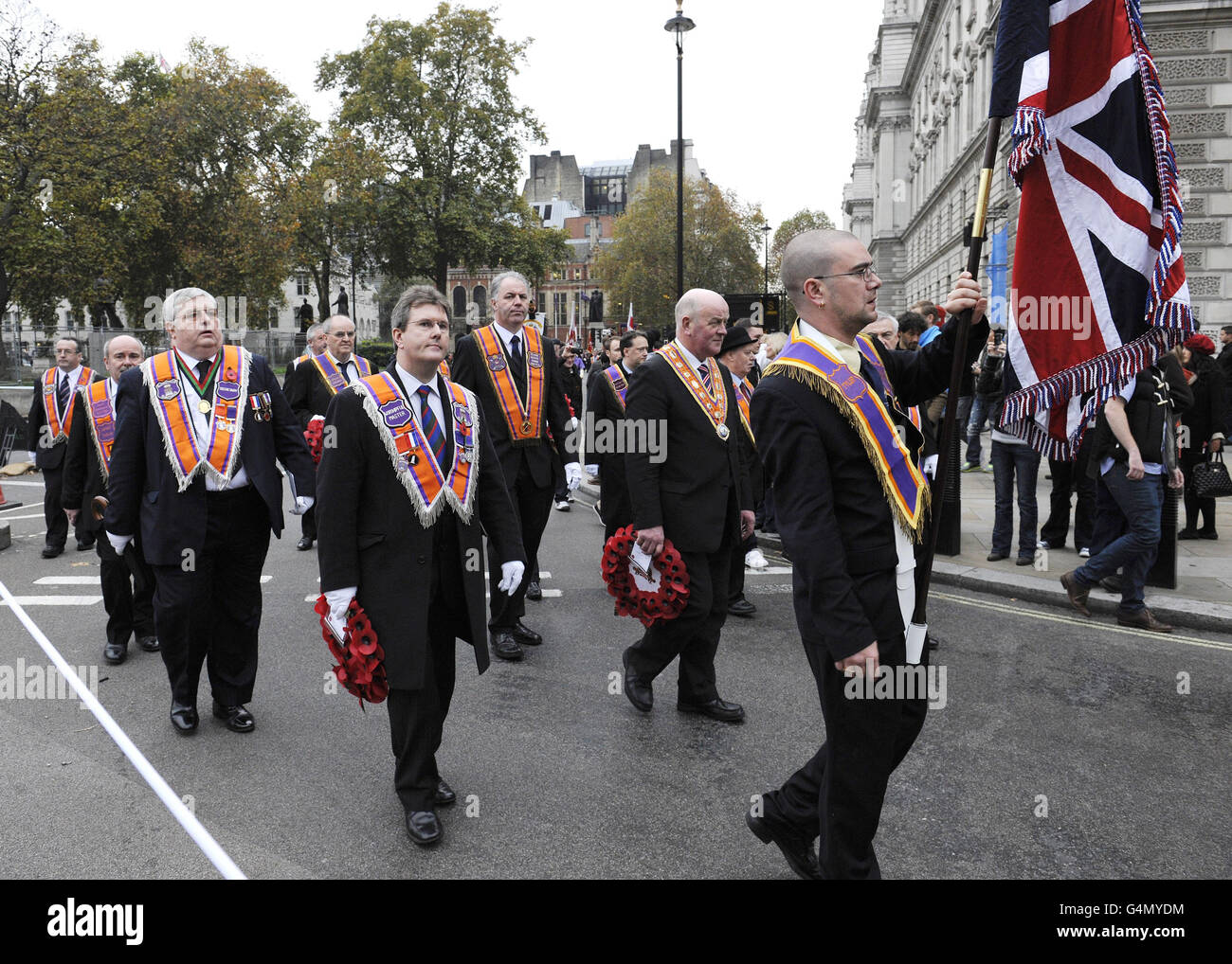 Members of the Protestant Orange Order commemorate Remembrance weekend ...