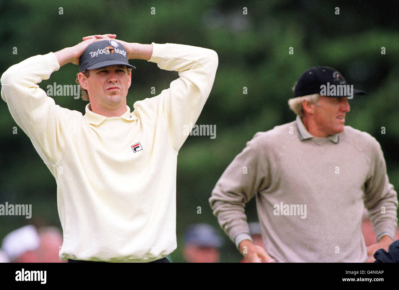 American lee janzen left australian greg on the 12th tee hi-res stock ...