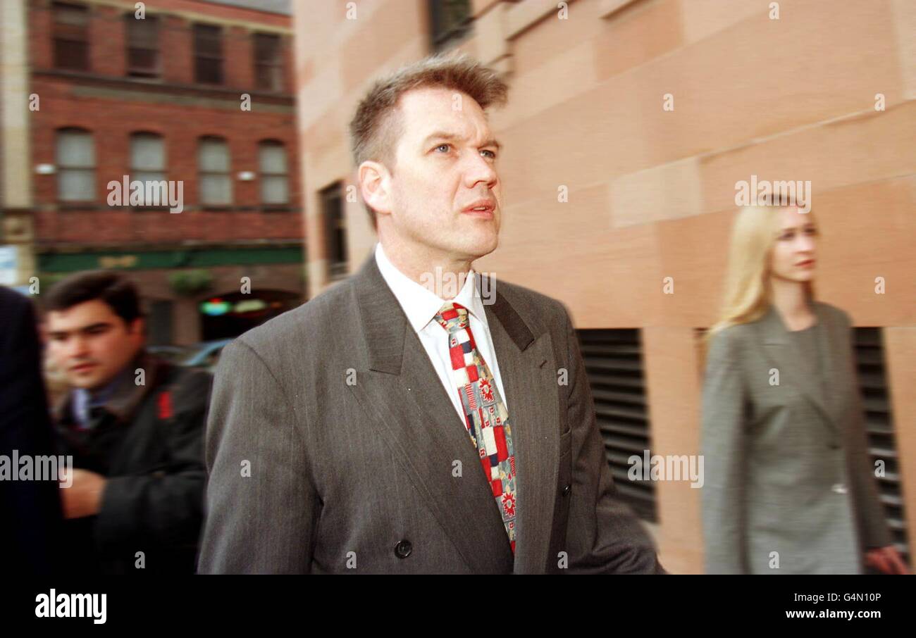Dr Jonathan Chamberlain arrives at Newcastle Crown Court on day four of his trial where he is ...