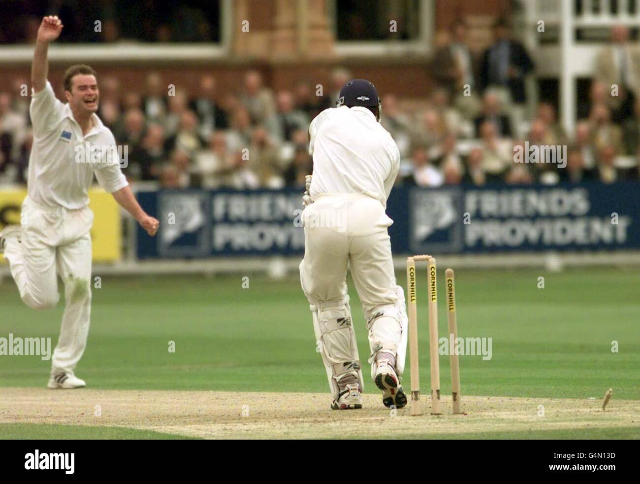 New Zealand bowler, Dion Nash, (left) celebrates the wicket of England ...