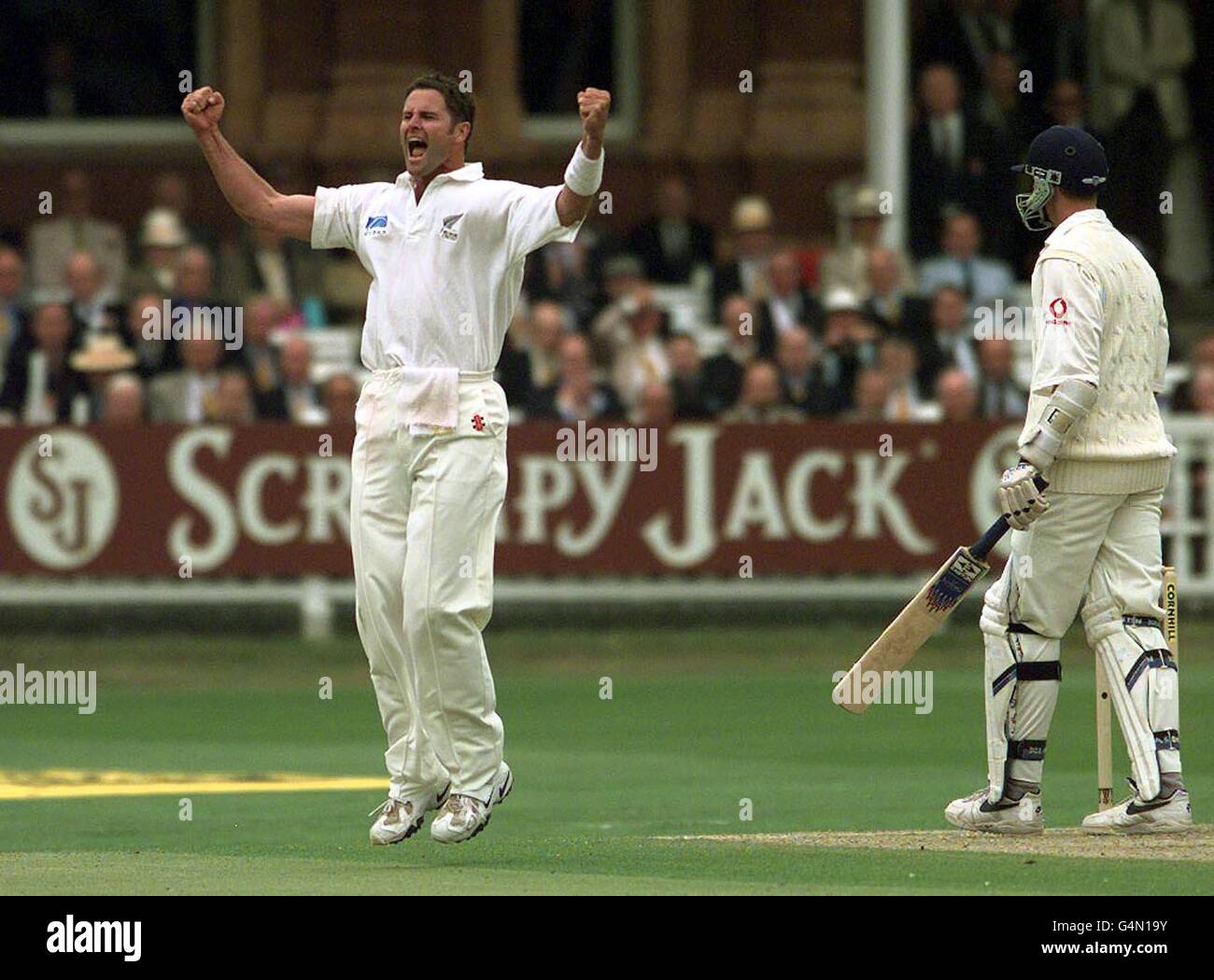 New Zealand bowler, Chris Cairns, celebrates the wicket of Alan ...