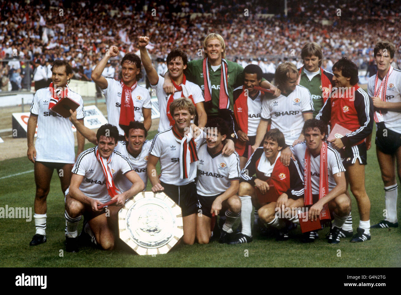 The Manchester United team celebrate with the Charity Shield after ...