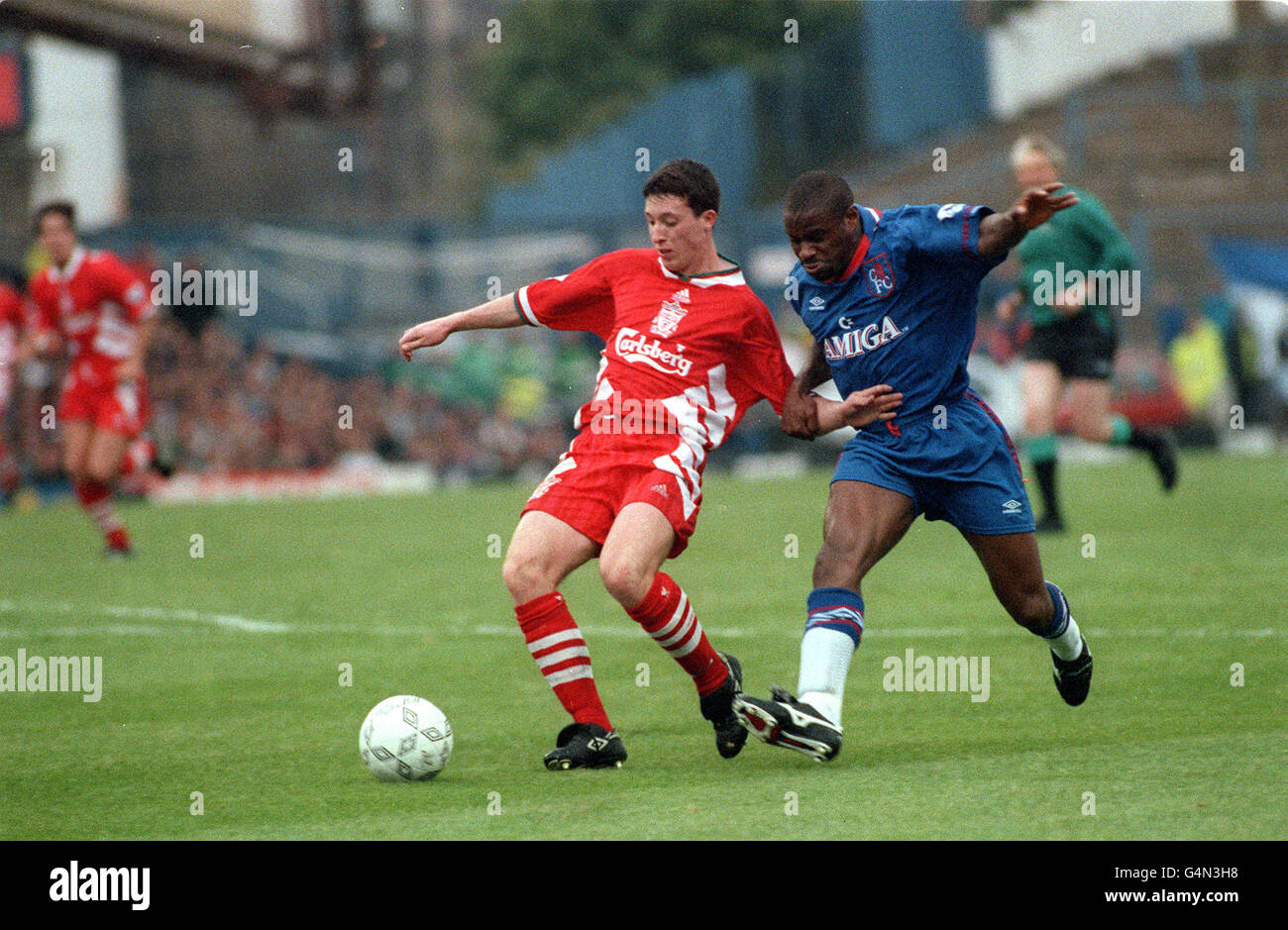 Football action running robbie fowler hi-res stock photography and ...