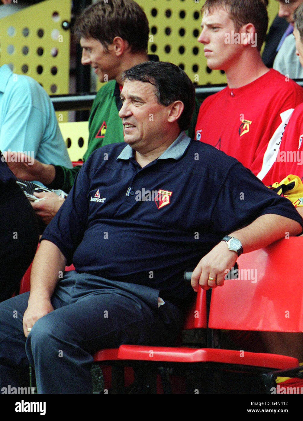 Watford manager Graham Taylor takes his seat in the dug-out before his ...