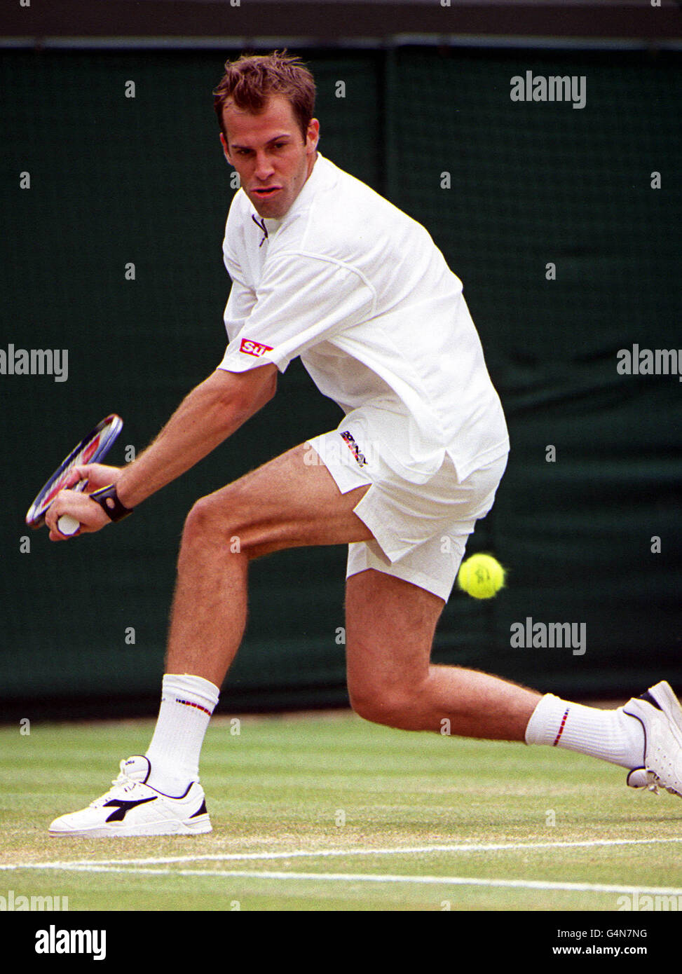 British tennis star Greg Rusedski in action during his match against ...