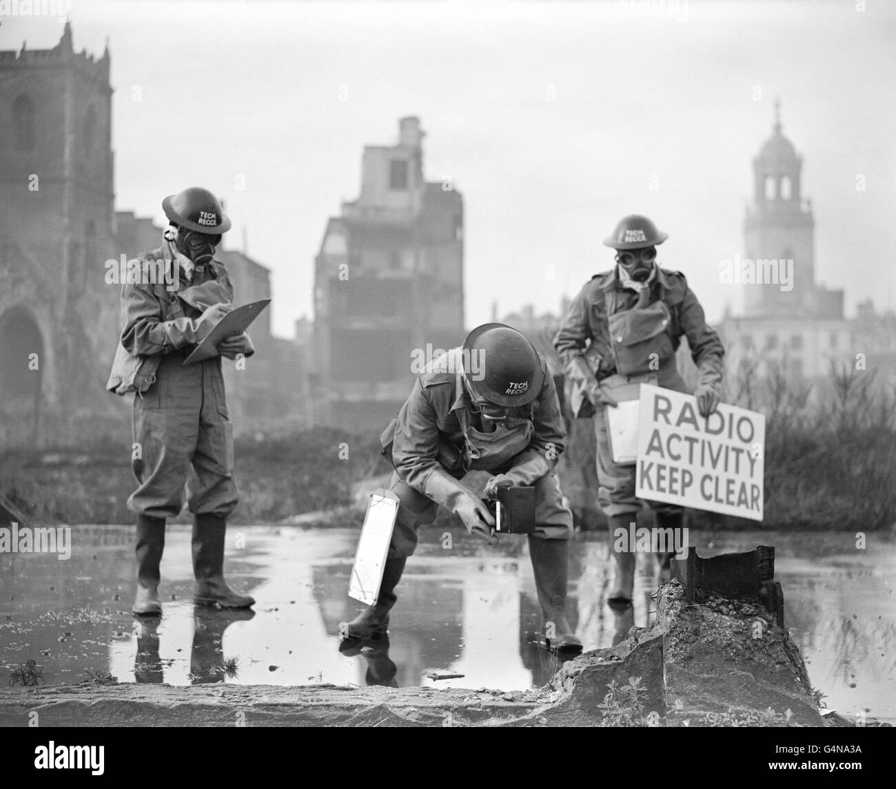 Civil defence reconnaissance unit making radiation test in wine street ...