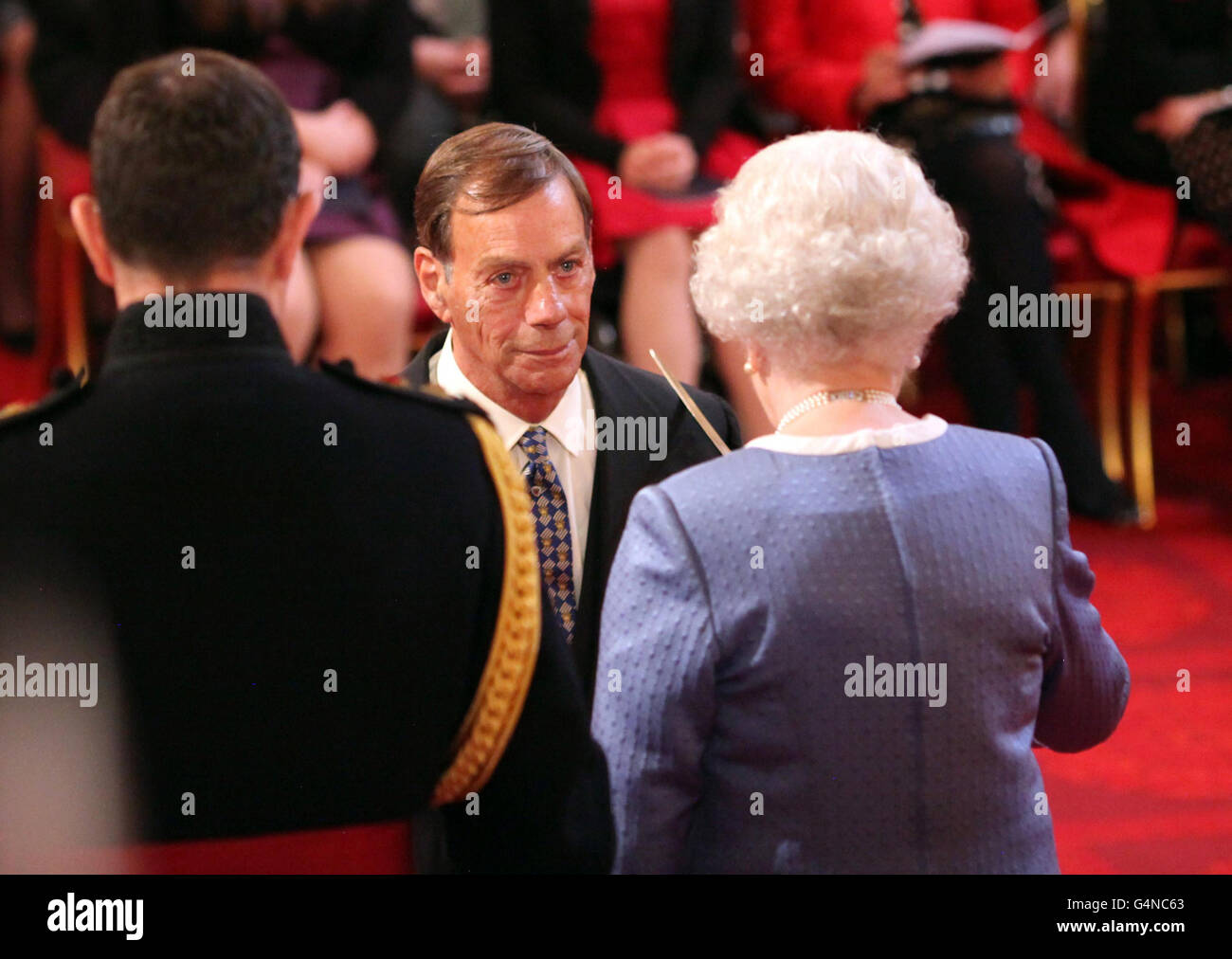 During An Investiture Ceremony With Britains Queen Elizabeth Ii High ...