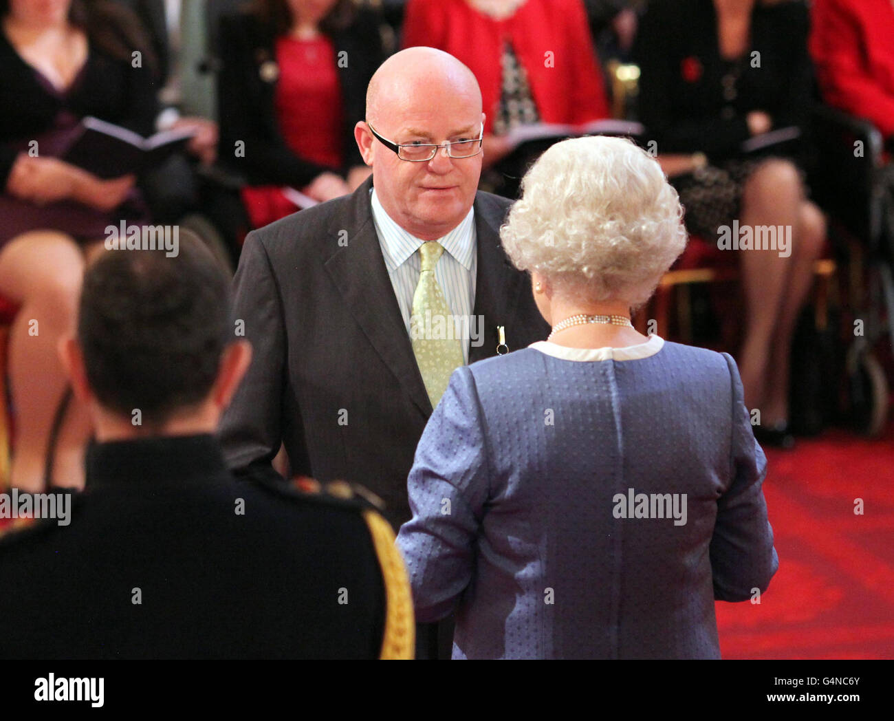 Jonathan Webber, from Wolverhampton, is made an MBE by Britain's Queen ...