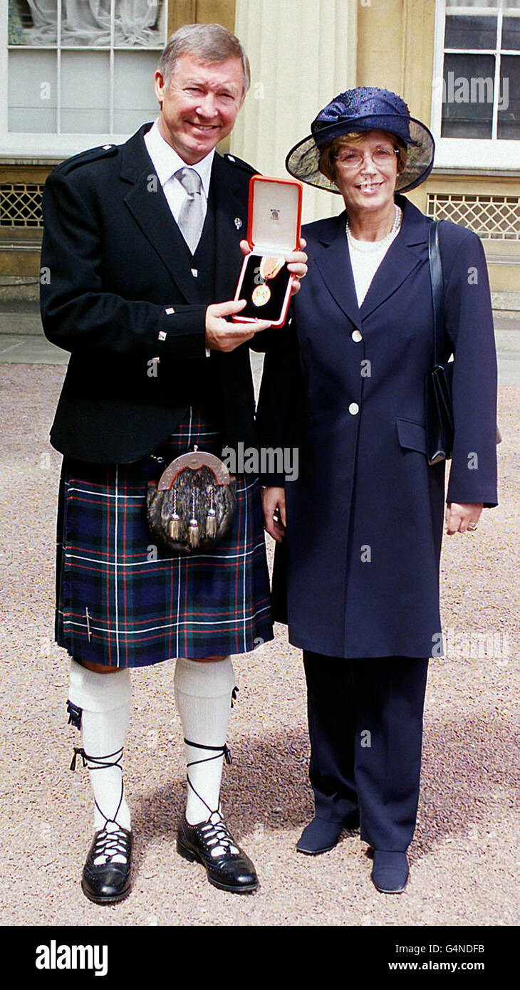 Manchester United manager Sir Alex Ferguson and wife Cathy after he was ...