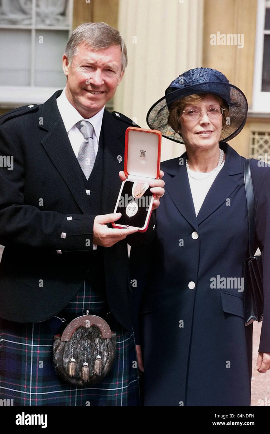 Manchester United manager Sir Alex Ferguson and wife Cathy after he was ...