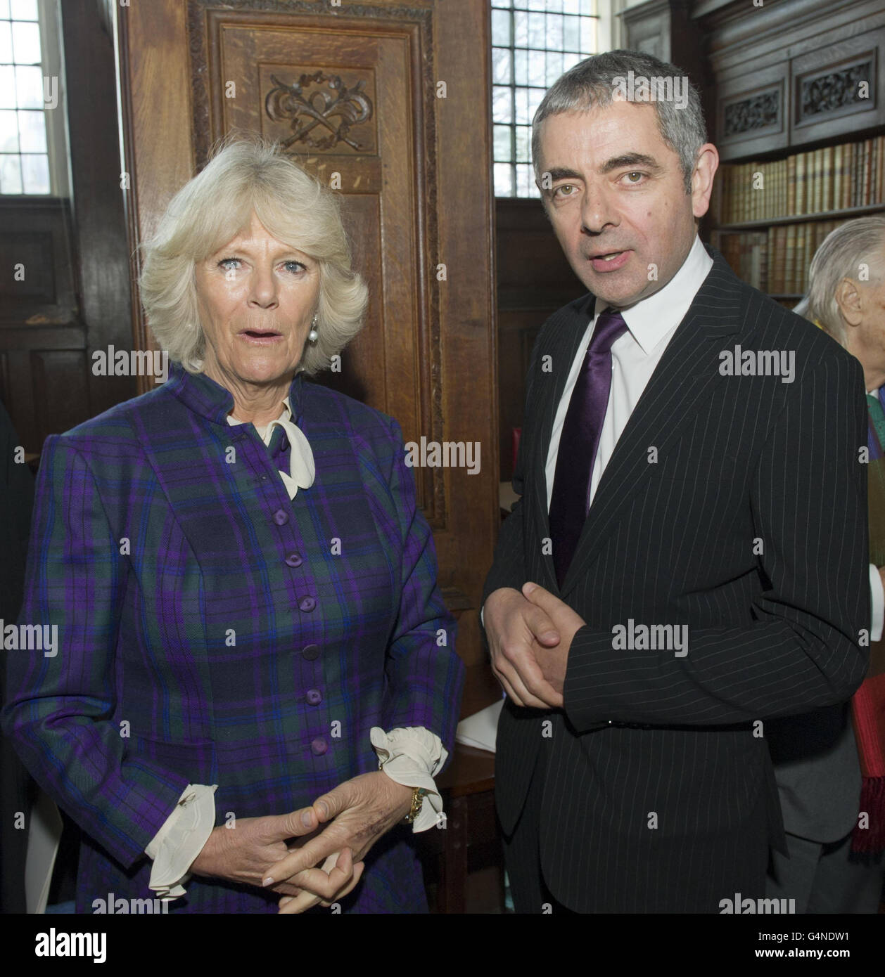 The Duchess of Cornwall and former student, comedian Rowan Atkinson at ...