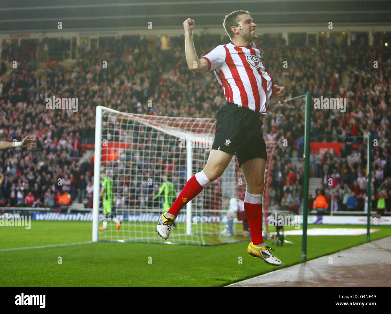 Southampton Rickie Lambert celebrates scoring the opening goal during ...