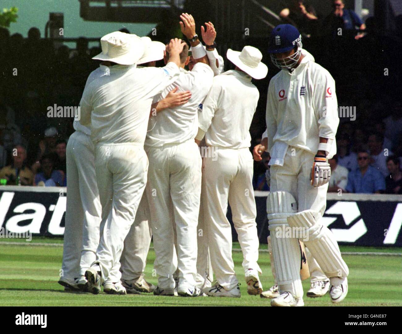 Dean Headley leaves the crease to make his way back to the pavilion ...