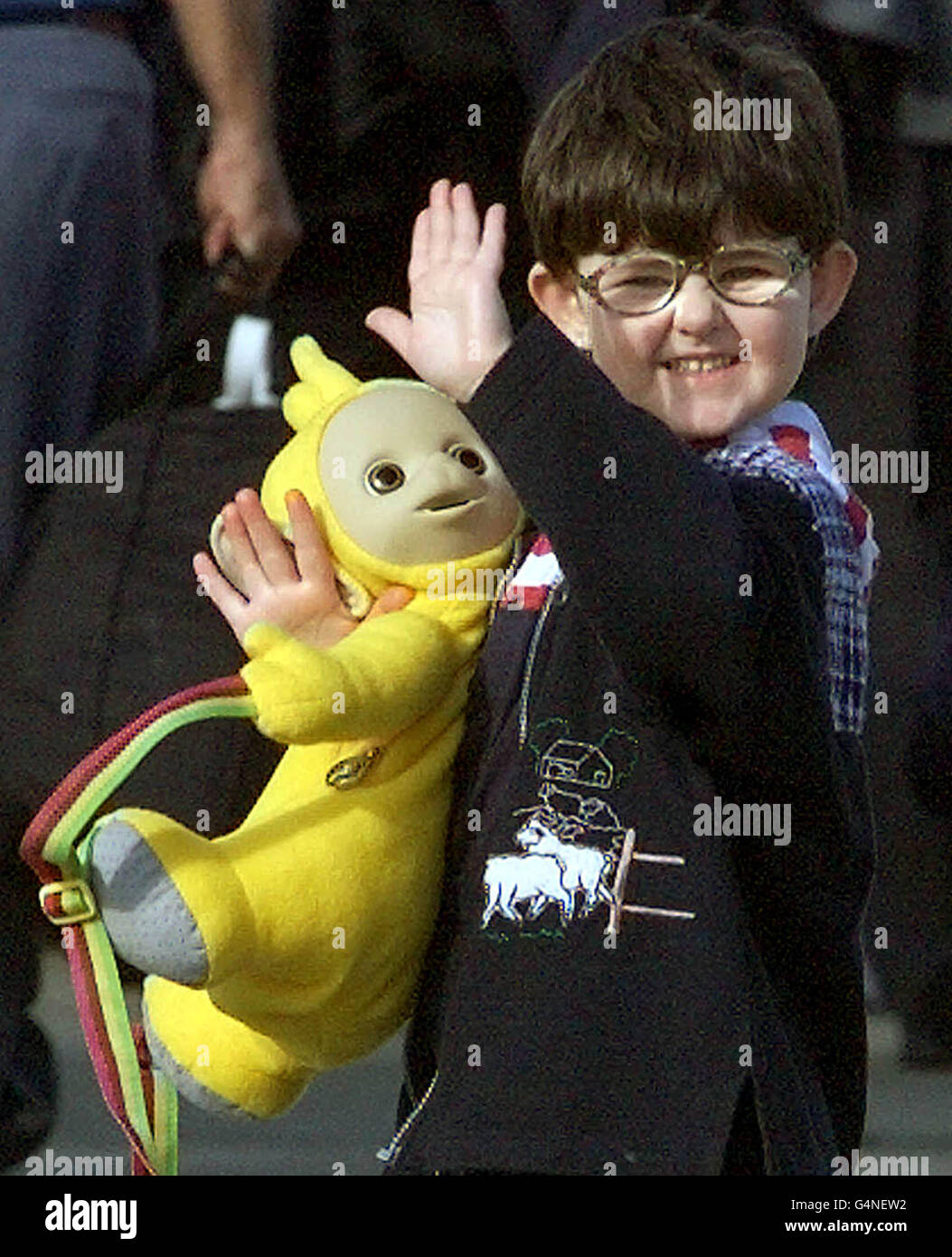 1 2 half length portrait waving smiling teletubby hi-res stock ...