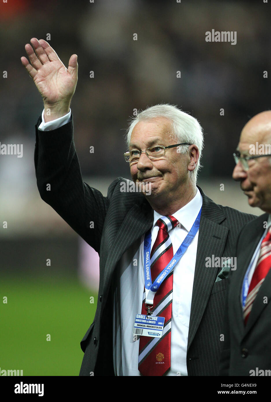 Busby Babe Kenneth Godfrey "Kenny" Morgans waves to the fans before ...