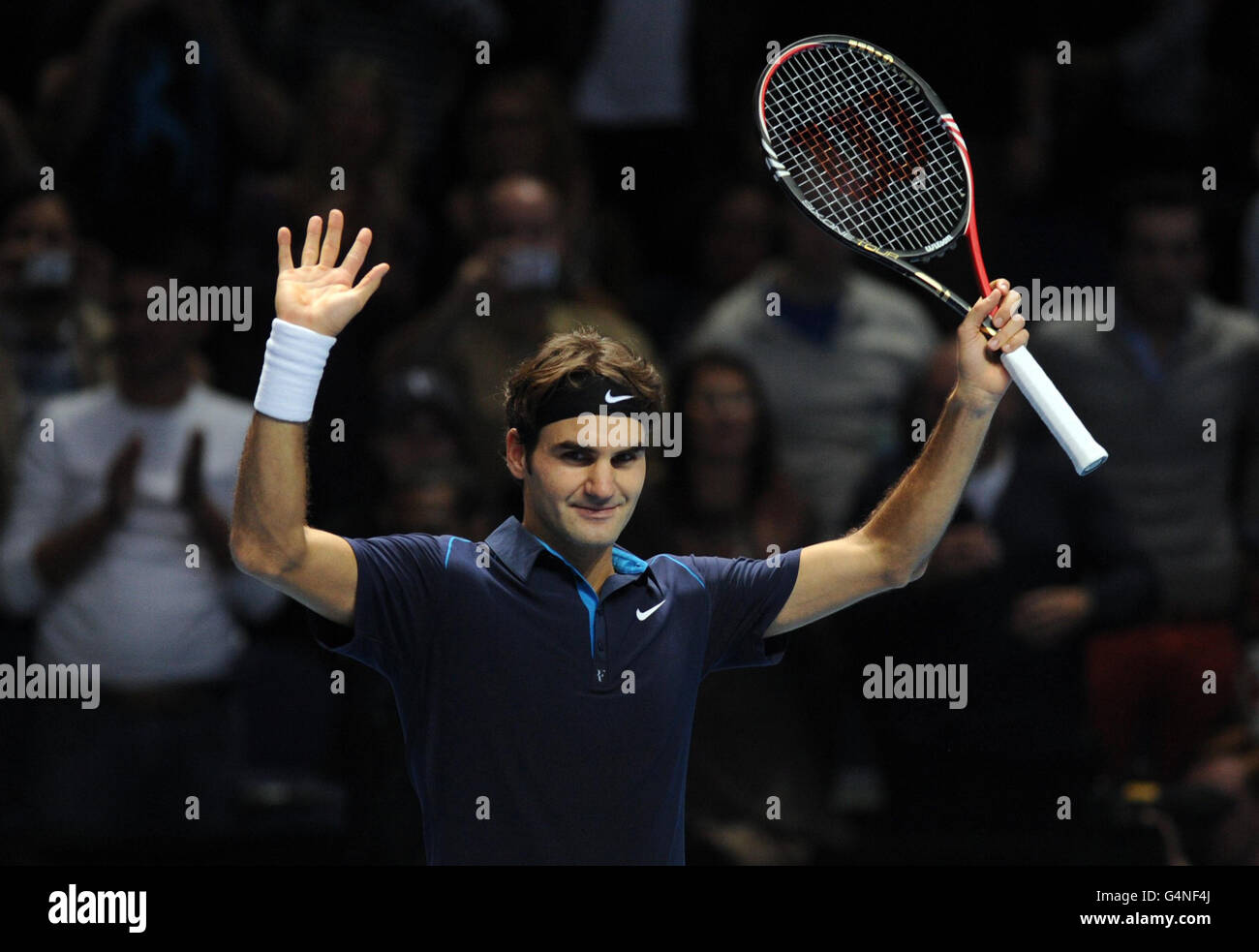 Switzerland's Roger Federer celebrates beating France's Joe Wilfried ...