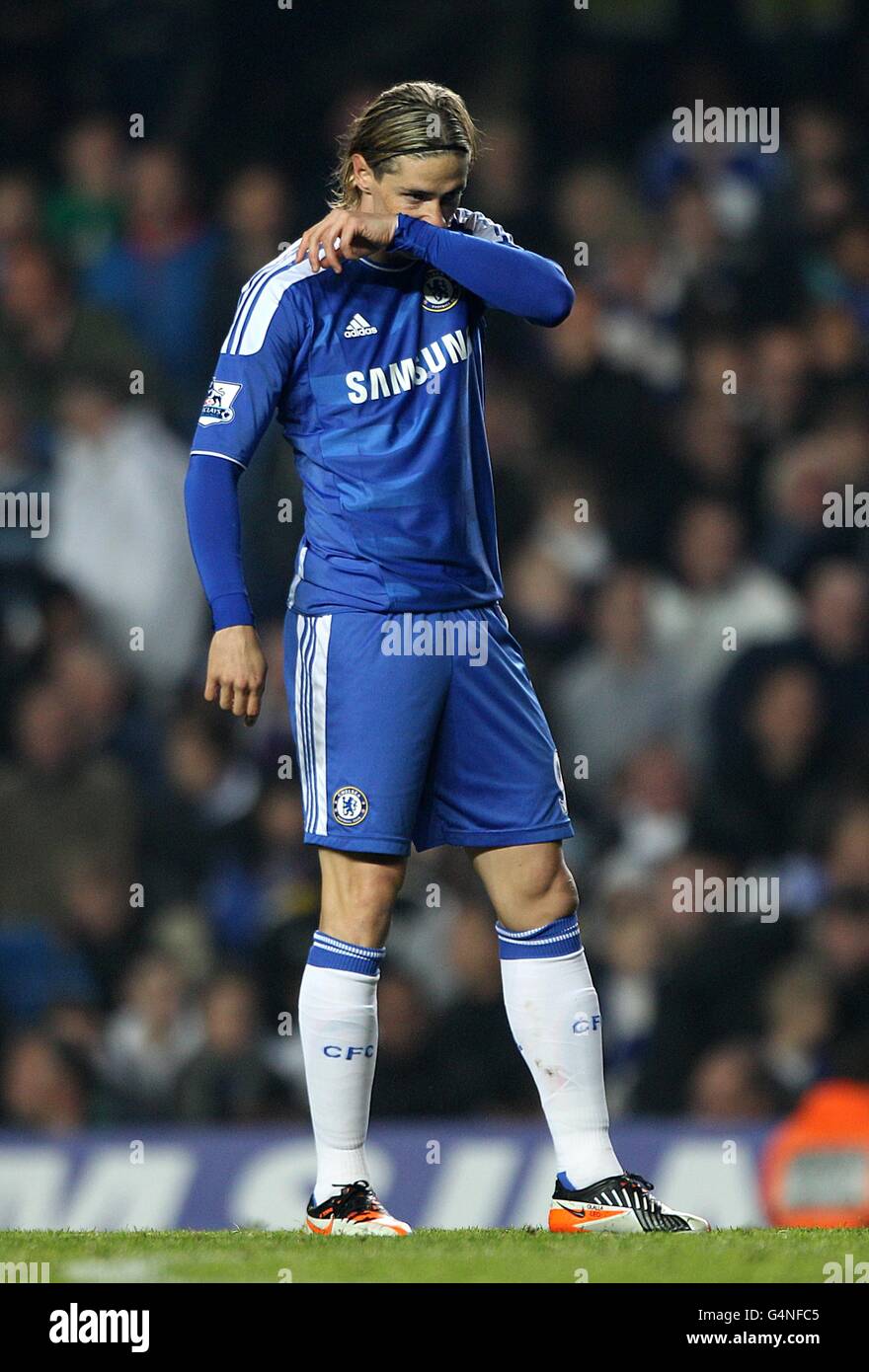 Chelseas fernando torres wipes nose hi-res stock photography and images ...