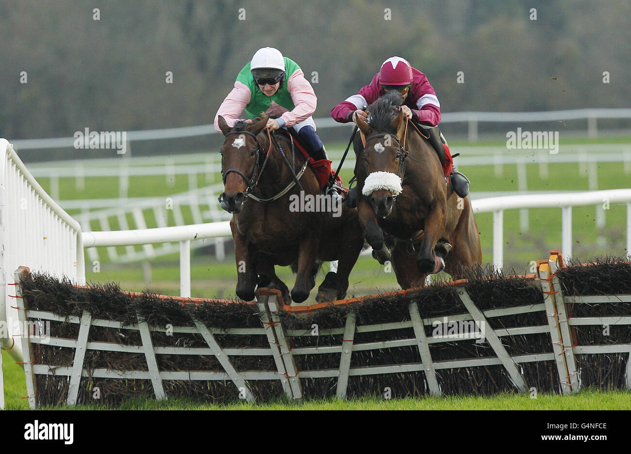 Dedigout under jockey Davey Russell (right) jumps the last to win the I ...