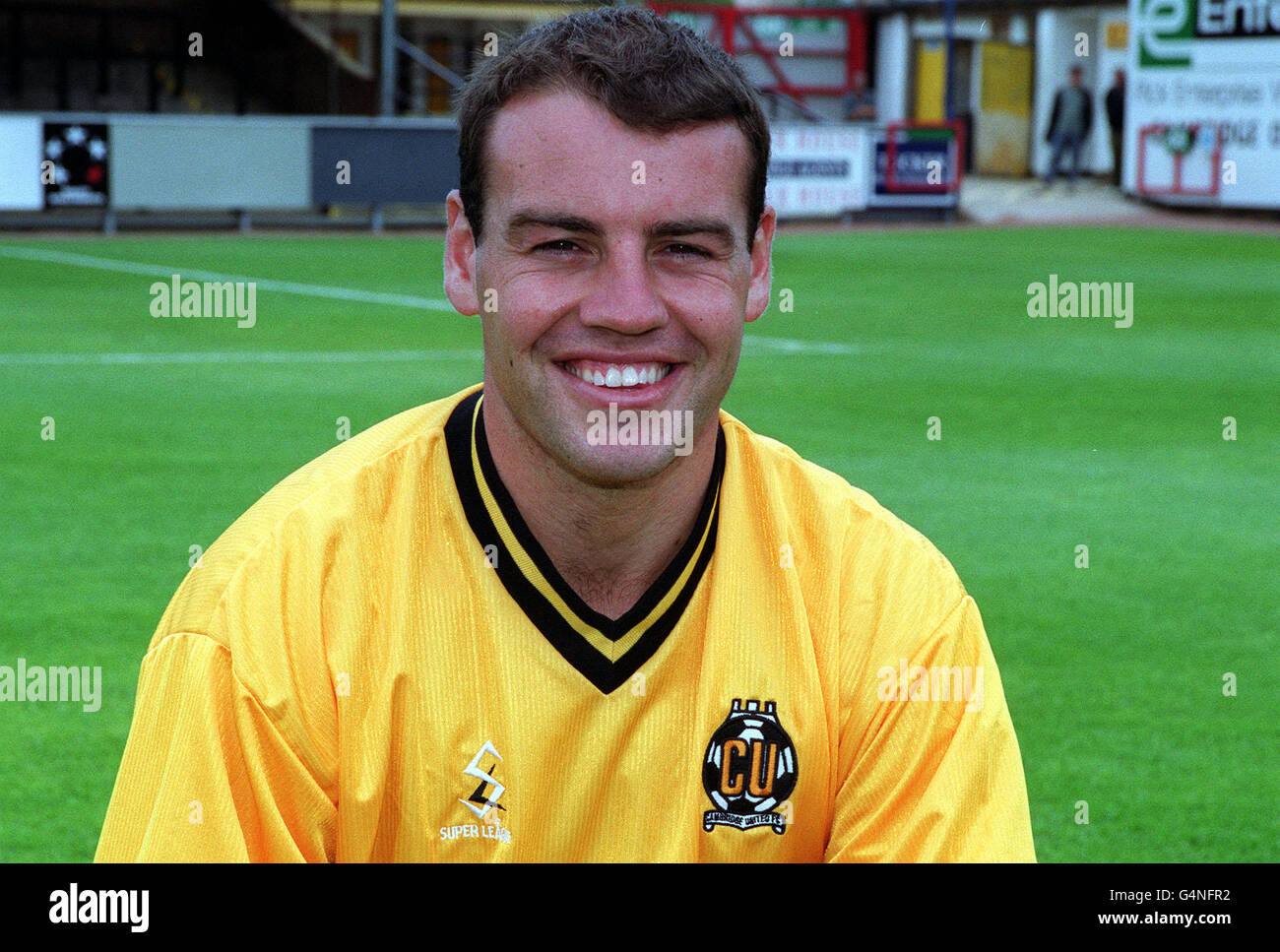 Head shoulders landscape football shirt sport football pitch smiling hi ...