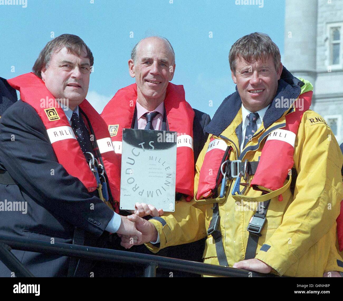 Britain's Deputy Prime Minister John Prescott presents a plaque to ...