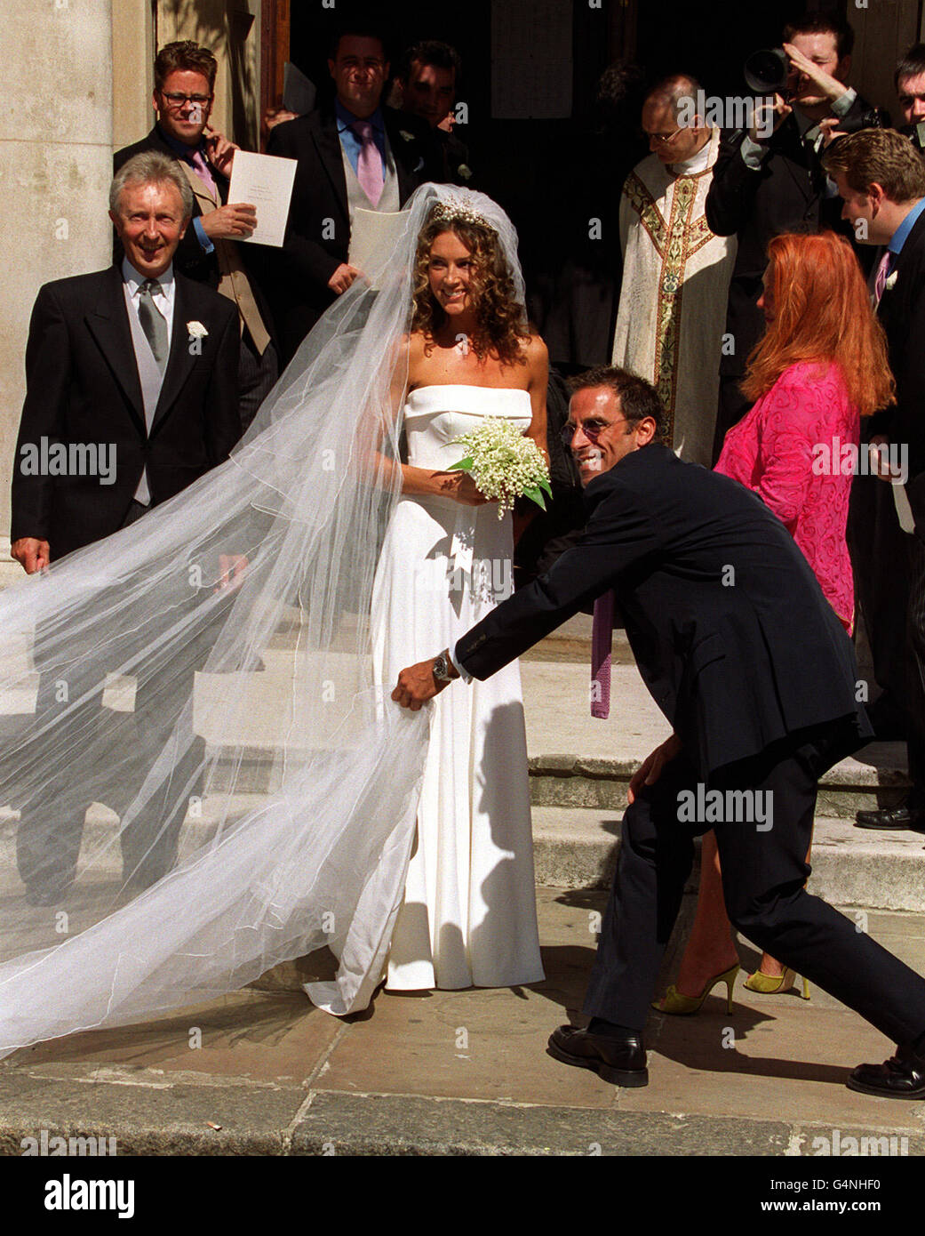 Bride Antonia Davies arrives at church for her wedding to television ...