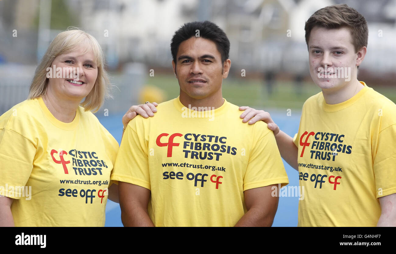 Glasgow Warriors rugby star David Lemi (centre) is pictured with June ...